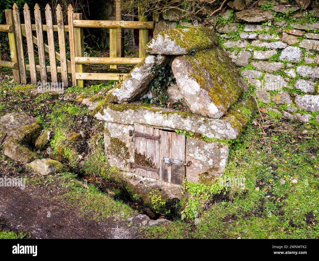 Saxon Well Head, probably 17th century, in the village of Widecombe in ...