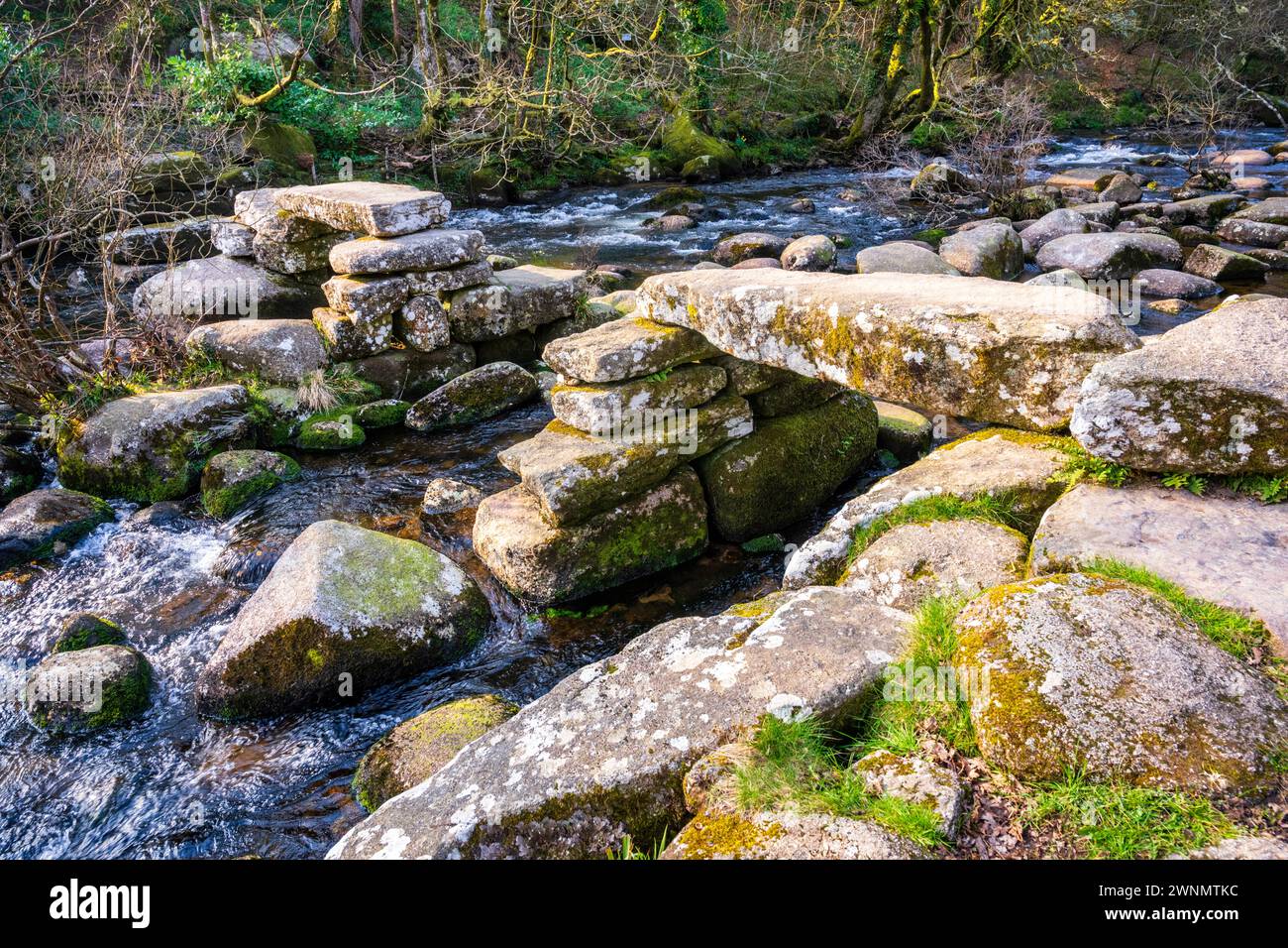 An incomplete ancient clapper bridge over the East Dart River at ...