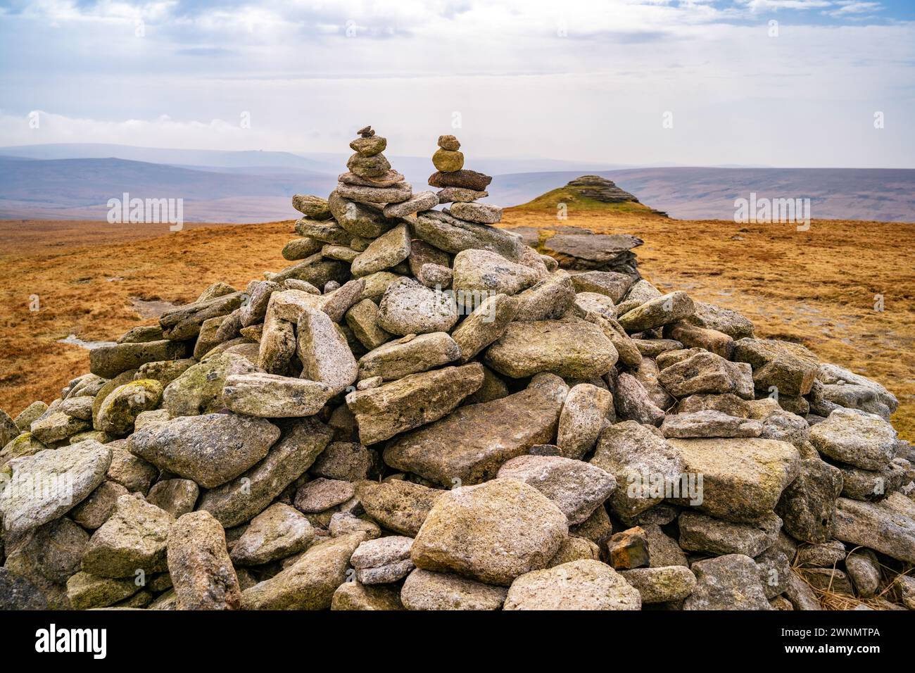 Rock cairn and outcropping on the summit of High Willhays, the highest ...