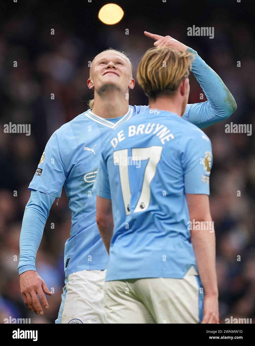 Manchester City's Erling Haaland (left) celebrates scoring their side's ...