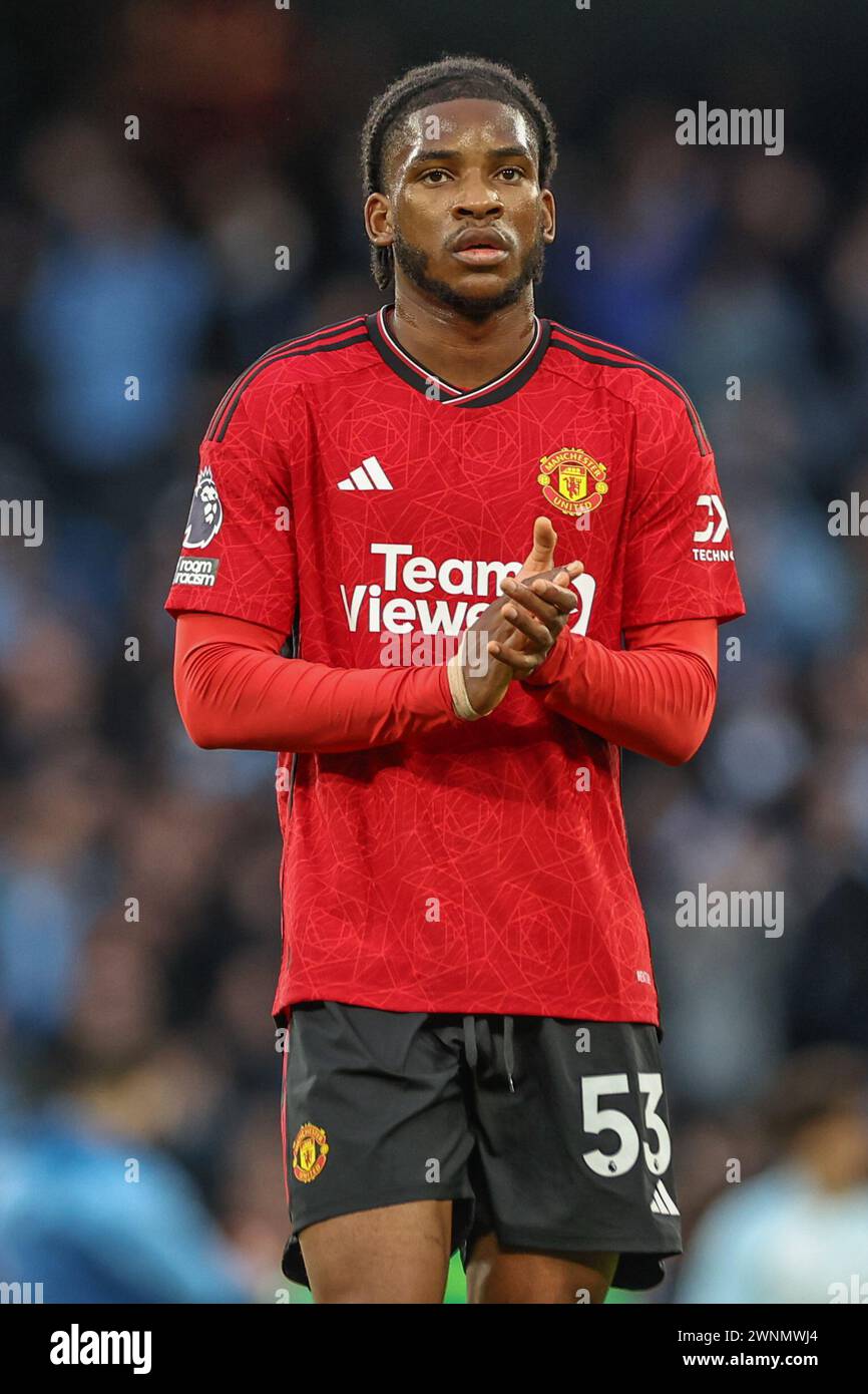 Willy Kambwala of Manchester United applauds the travelling fans during ...