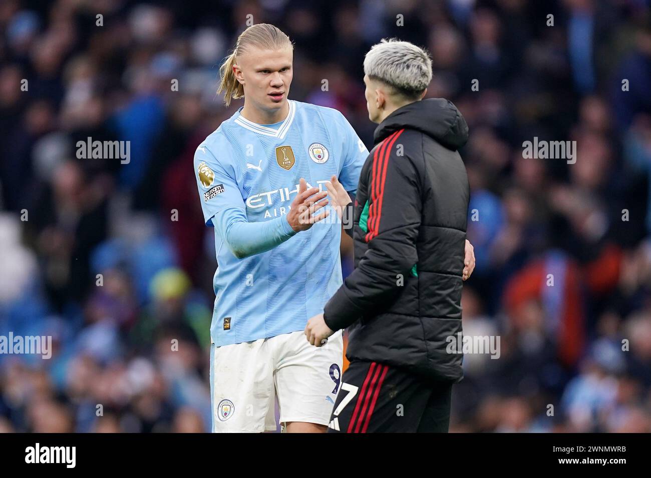 Manchester City's Erling Haaland (left) with Manchester United's ...