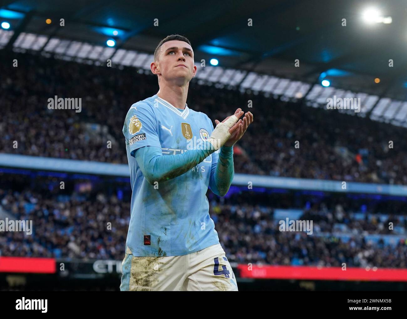 Manchester, UK. 3rd Mar, 2024. Phil Foden of Manchester City applauds ...