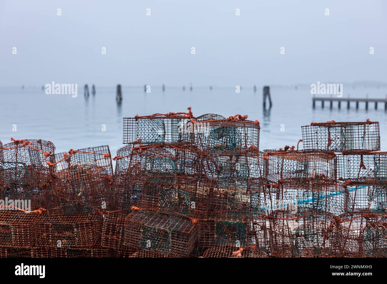 stack of fishing traps in the Chioggia lagoon Stock Photo - Alamy