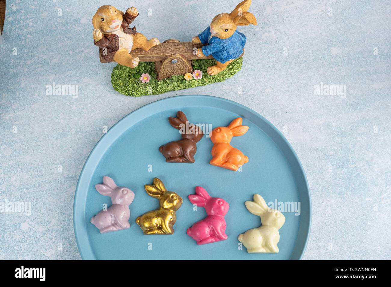 Small colorful milk chocolate and white chocolate bunnies 1 Stock Photo ...