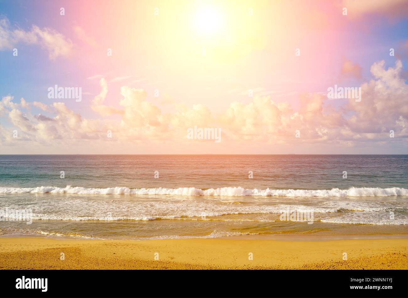 Fantastic sunset over ocean, sea waves and sand Stock Photo - Alamy