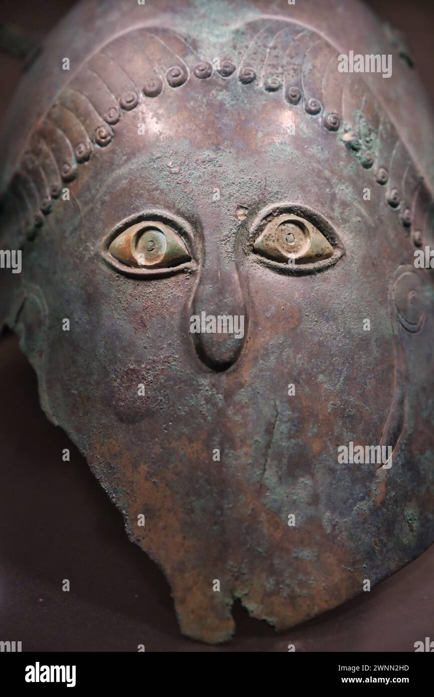 Bronze mask inside the archaeologic museum of Santa Scolastica in Bari ...