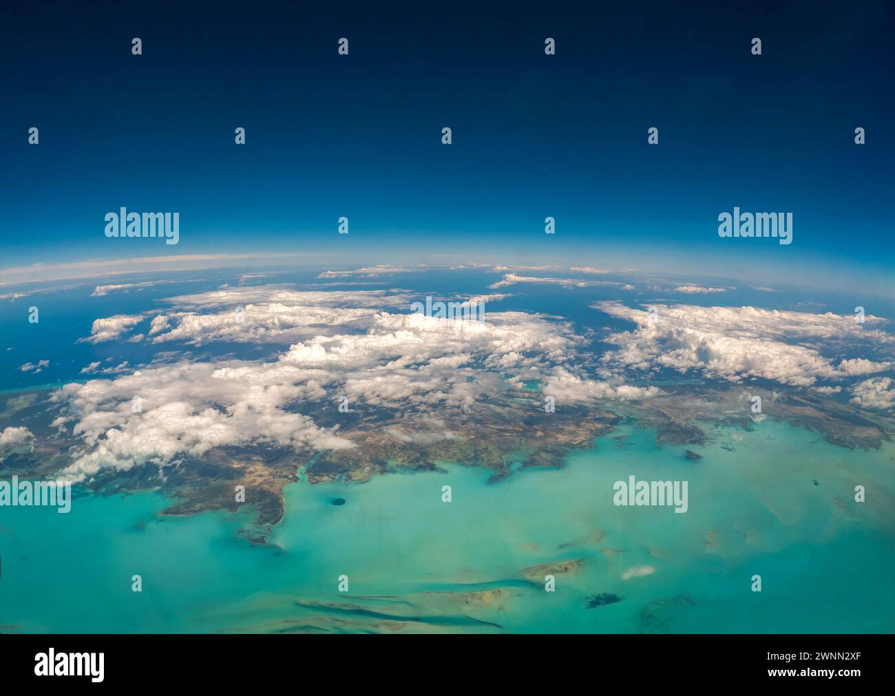 An aerial view of the Turks and Caicos Islands from an airplane window ...