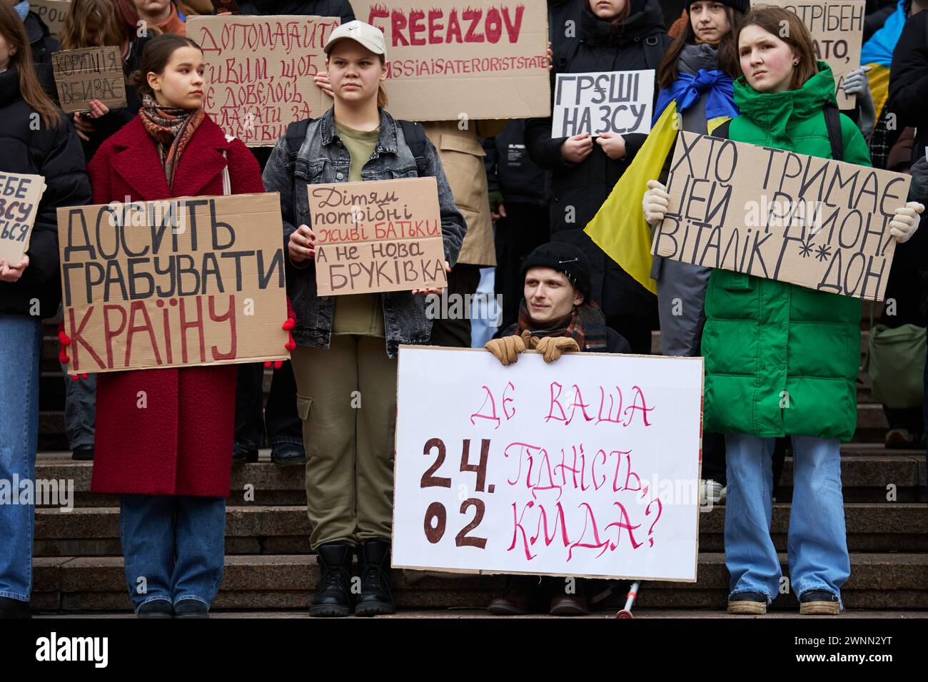 Young Ukrainian activists posing with banner against corruption in ...