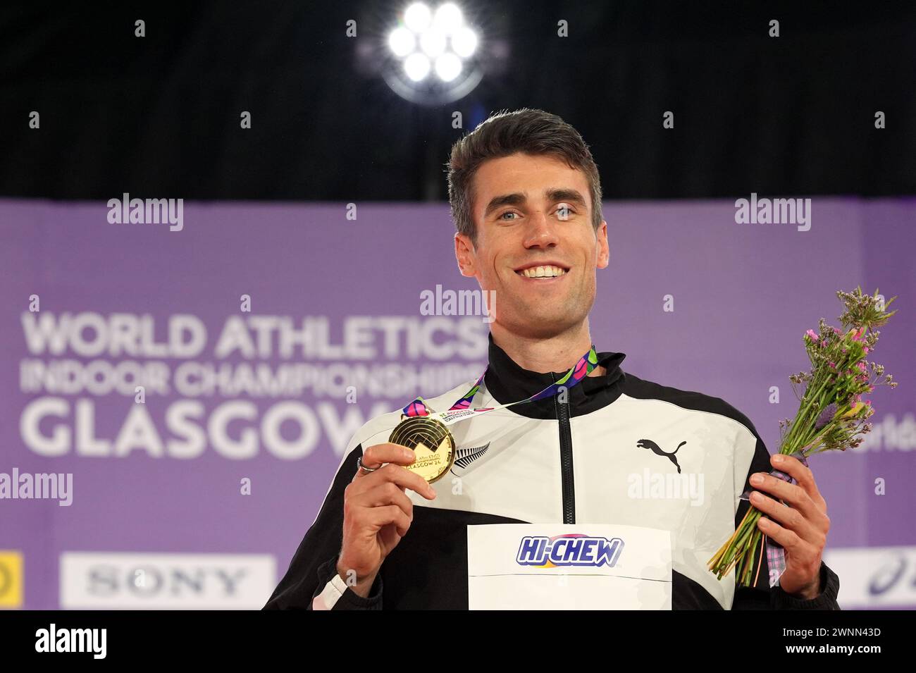 New Zealand's Hamish Kerr celebrates gold on the podium for the Men's ...