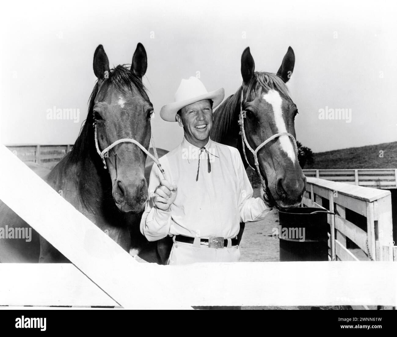 DAN DAILEY circa 1952 at home with his horses publicity for Twentieth ...
