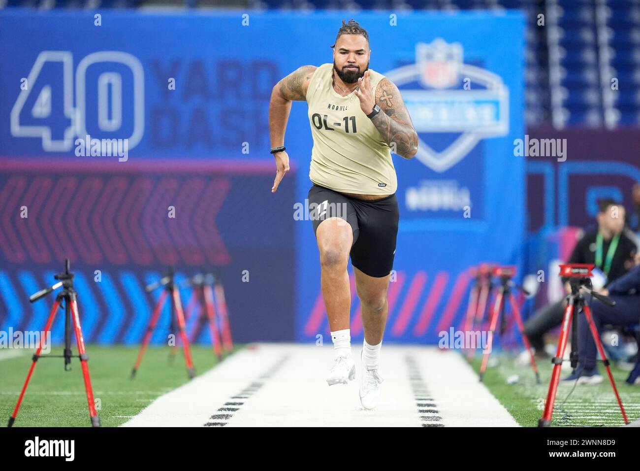 TCU offensive lineman Andrew Coker runs the 40-yard dash at the NFL ...