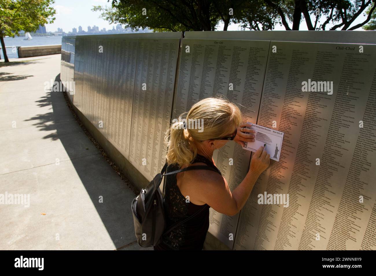 Visitors to the Ellis Island Immigration Museum where exhibits and ...