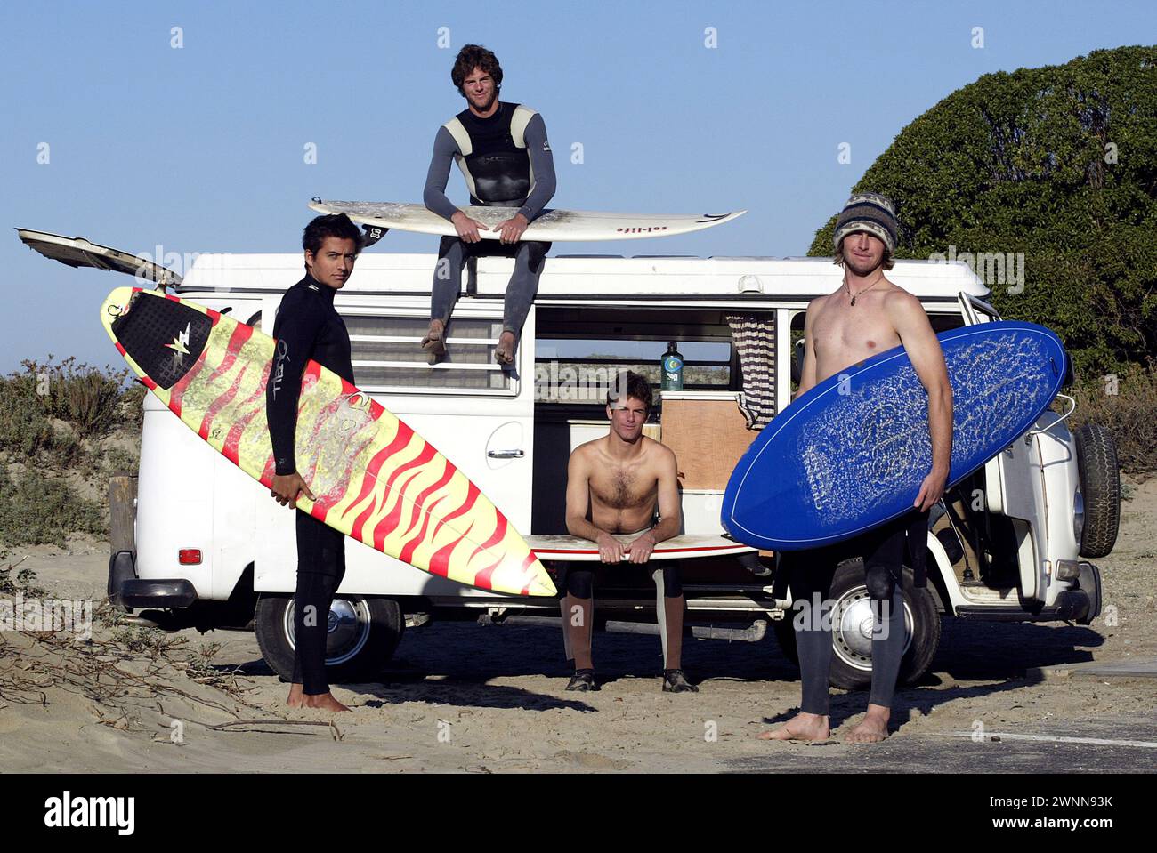 SURFERS- (L-R) Mike Kalish ( black Xcel wetsuit), twin brother Charlie ...