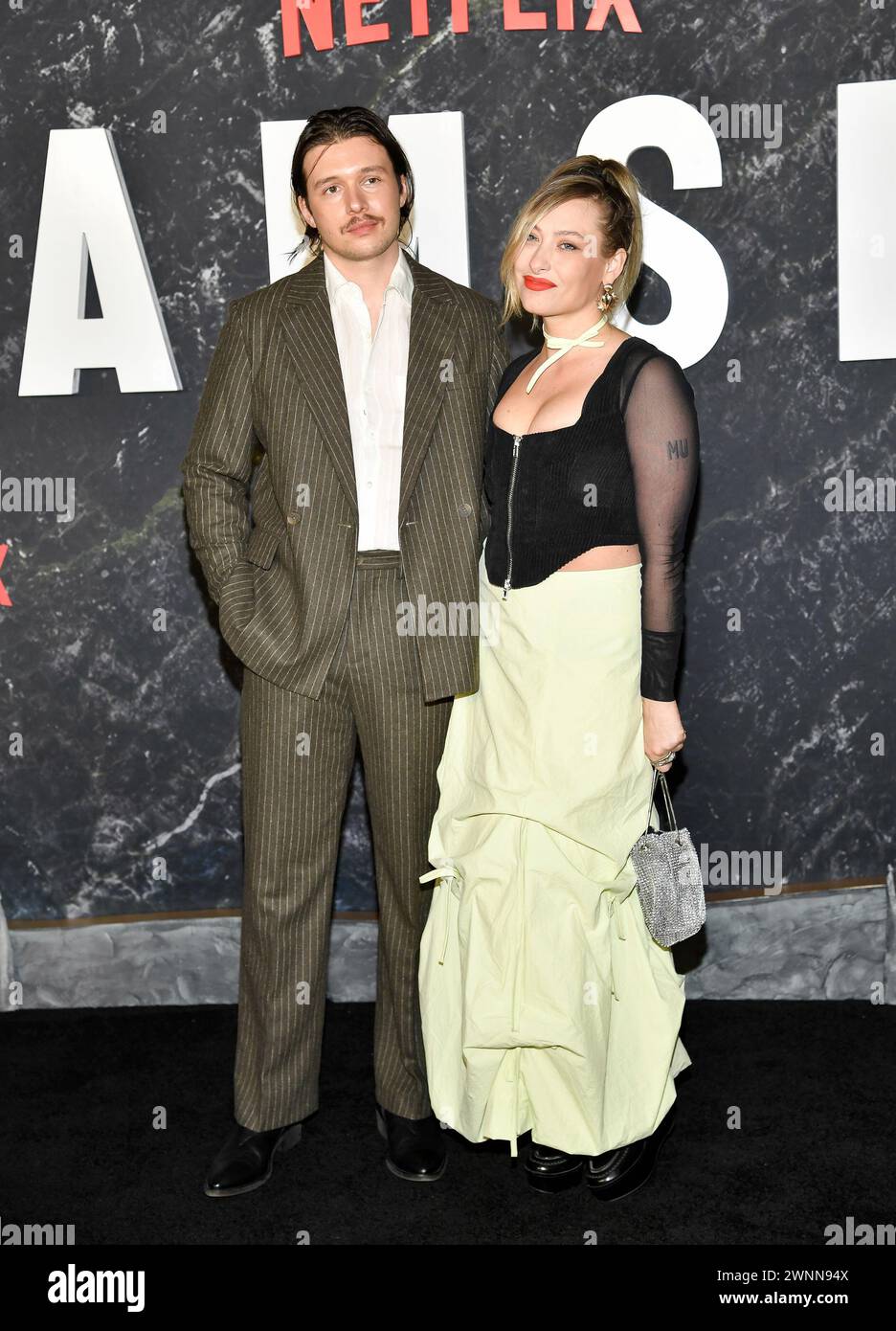 Nick Robinson, left, and Samantha Urbani attend the premiere of Netflix ...