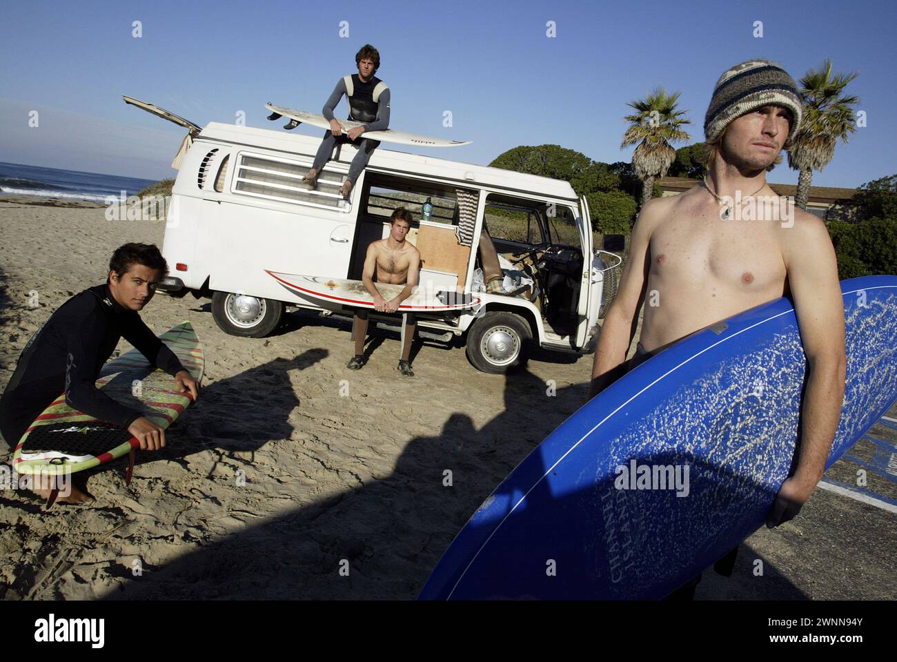 SURFERS- (L-R) Mike Kalish ( black Xcel wetsuit), twin brother Charlie Kalish (brown wetsuit ...