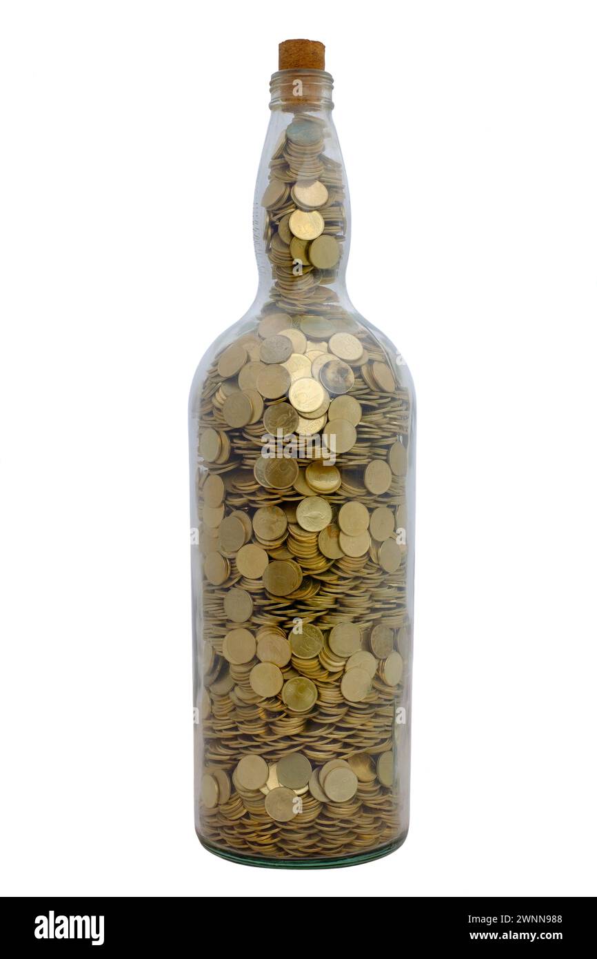 large old whiskey bottle filled to the brim with hungarian five forint ...