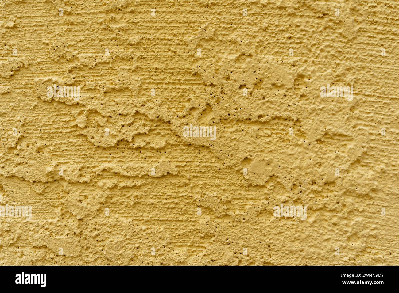 high texture yellow stucco cement background Stock Photo - Alamy