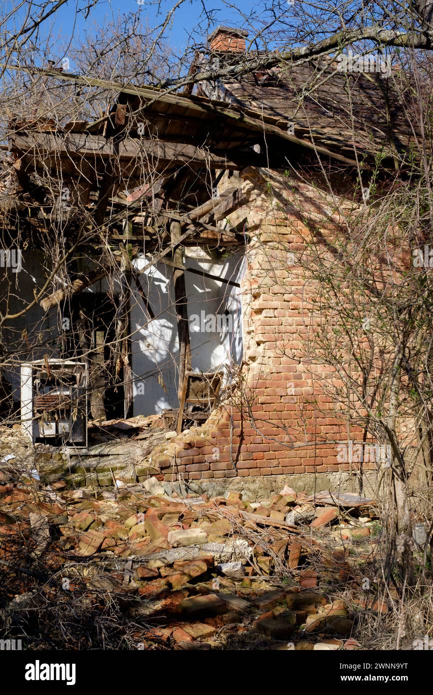 exterior view derelict abandoned wreck of crumbling collapsing rural ...