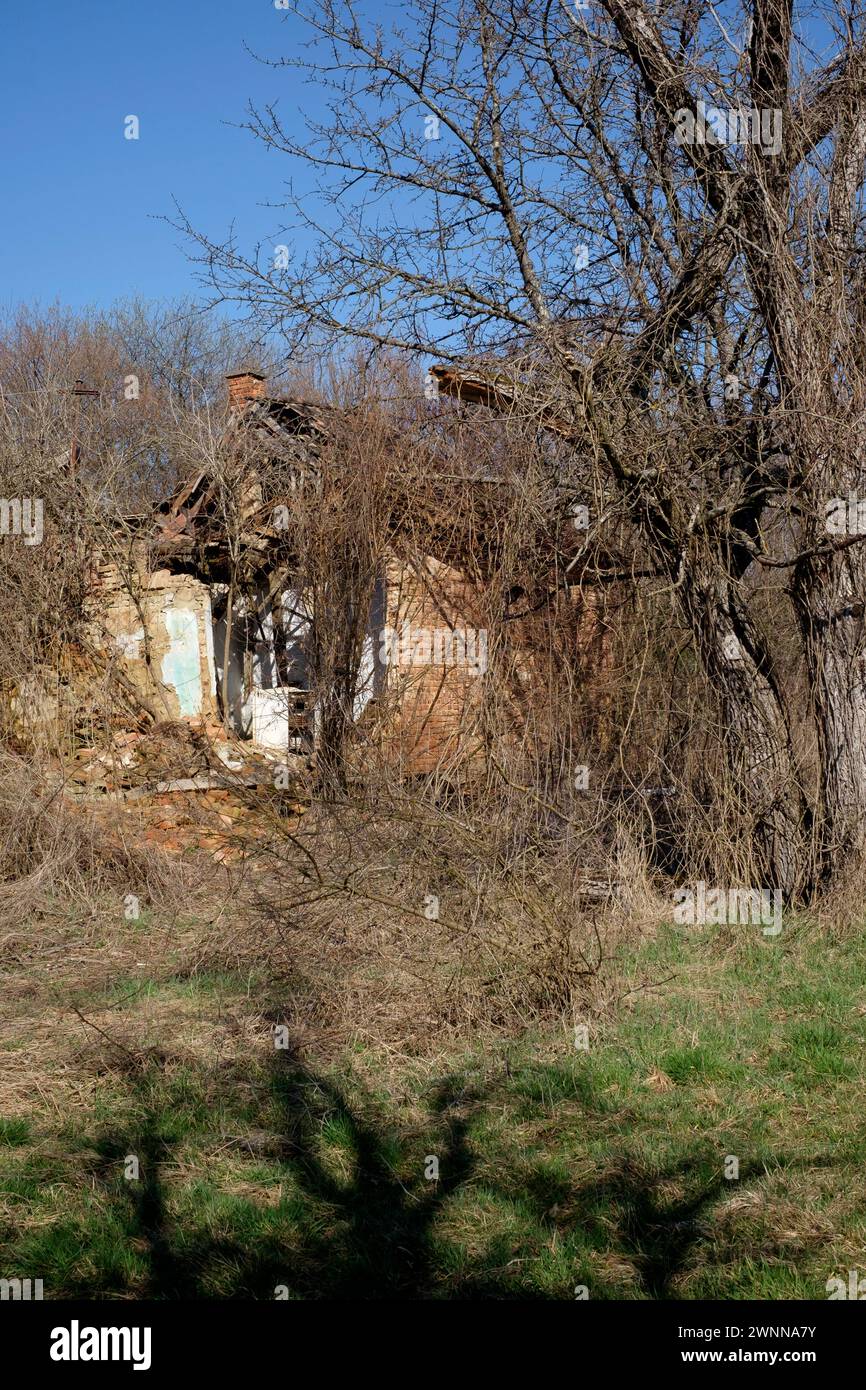 exterior view derelict abandoned wreck of crumbling collapsing rural ...