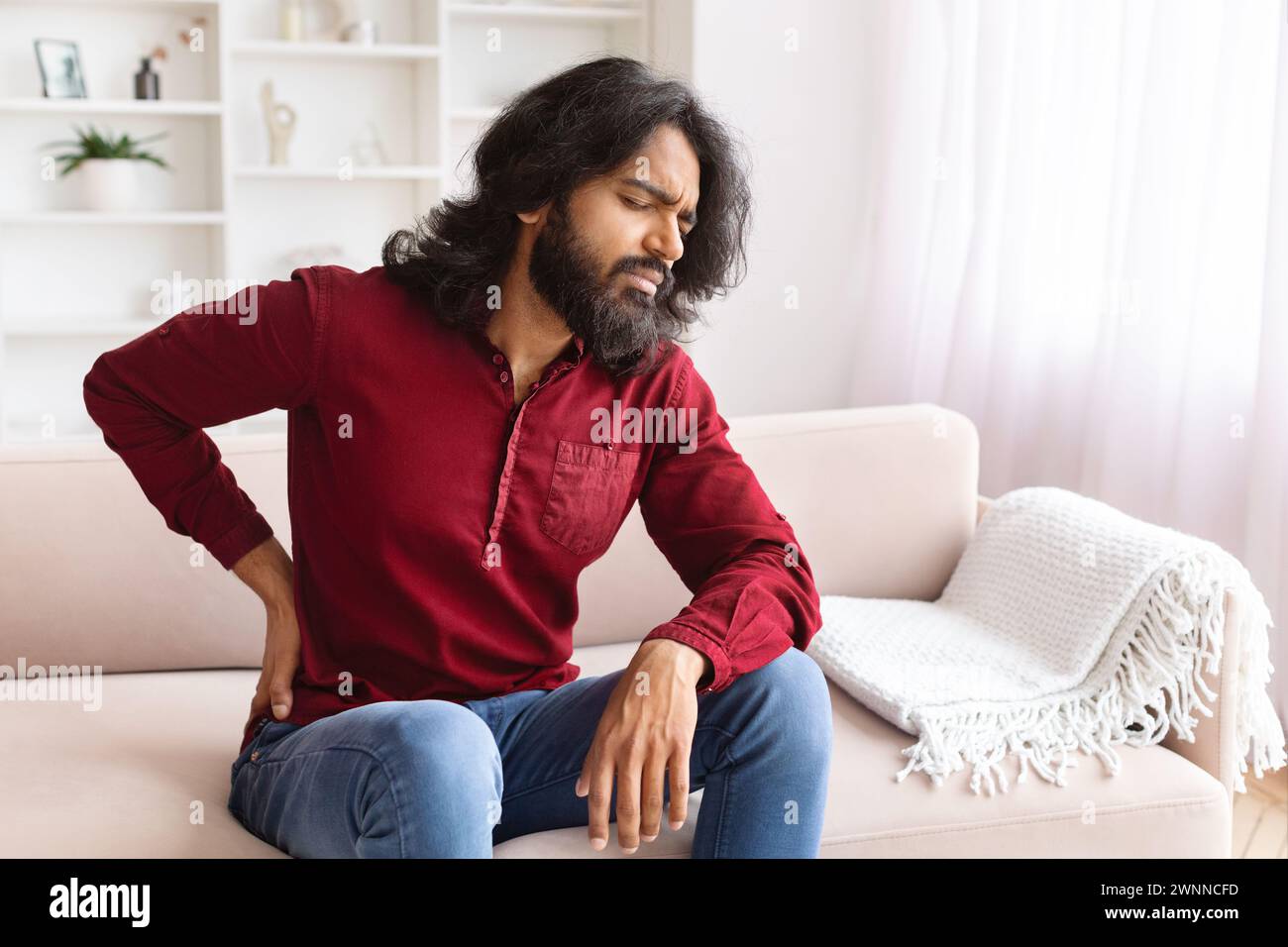 Indian man backache pain illness hi-res stock photography and images ...