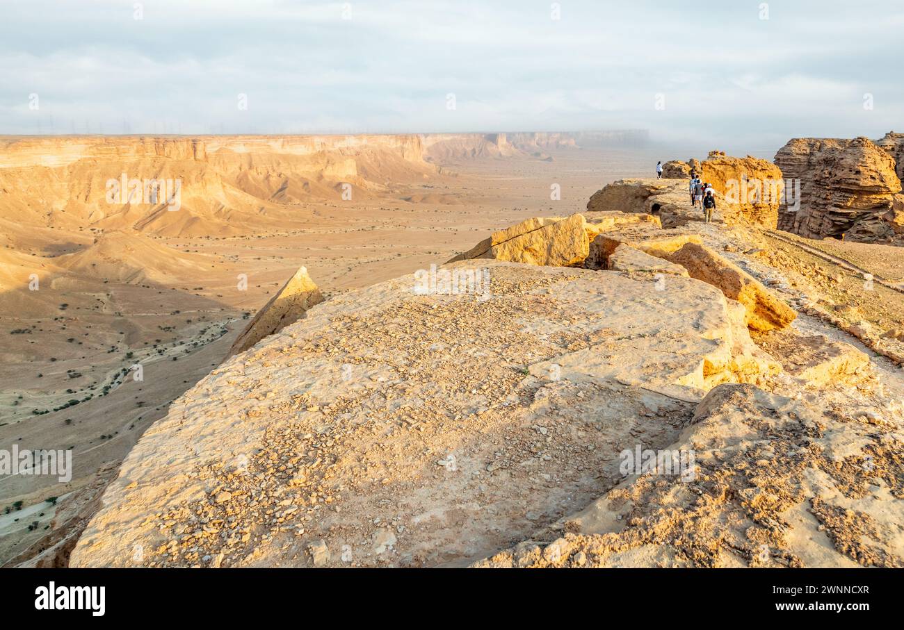 The Jabal Tuwaiq Mountains, with desert below landscape and tourist ...