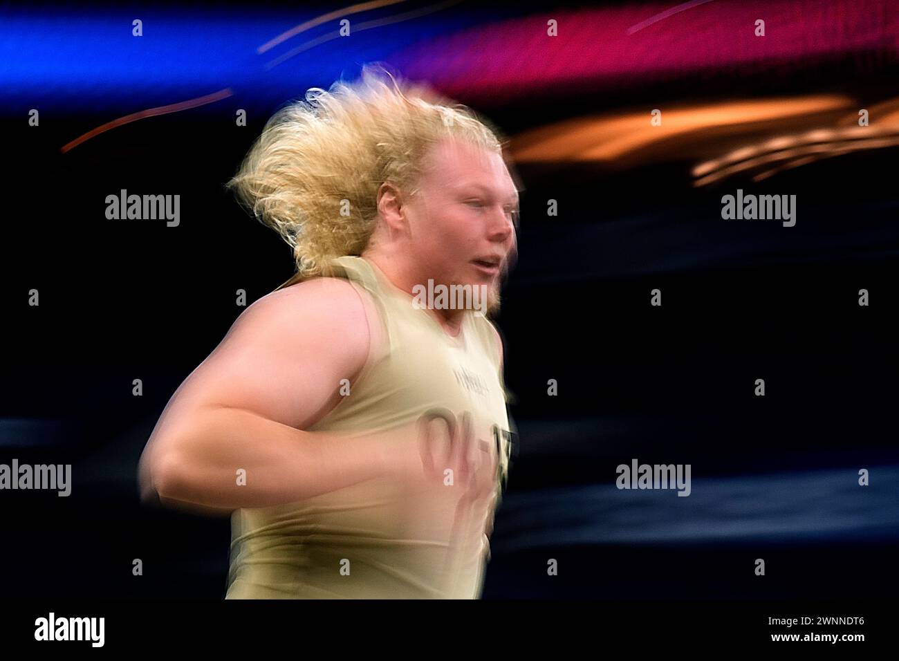 Wyoming offensive lineman Frank Crum runs in the 40-yard dash during ...