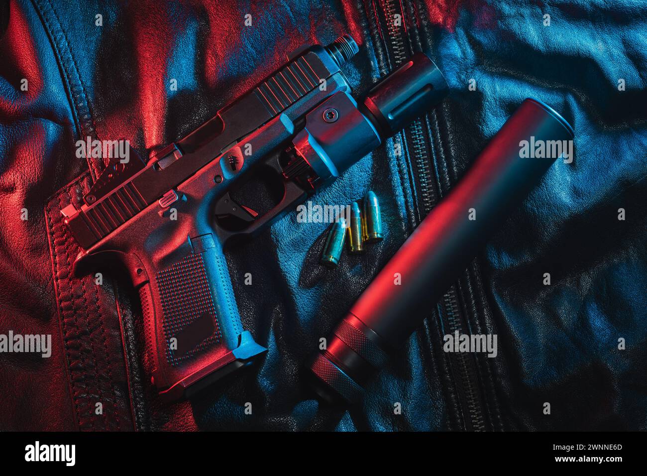 Tactical weapon, pistol with flashlight, red dot and silencer. High ...