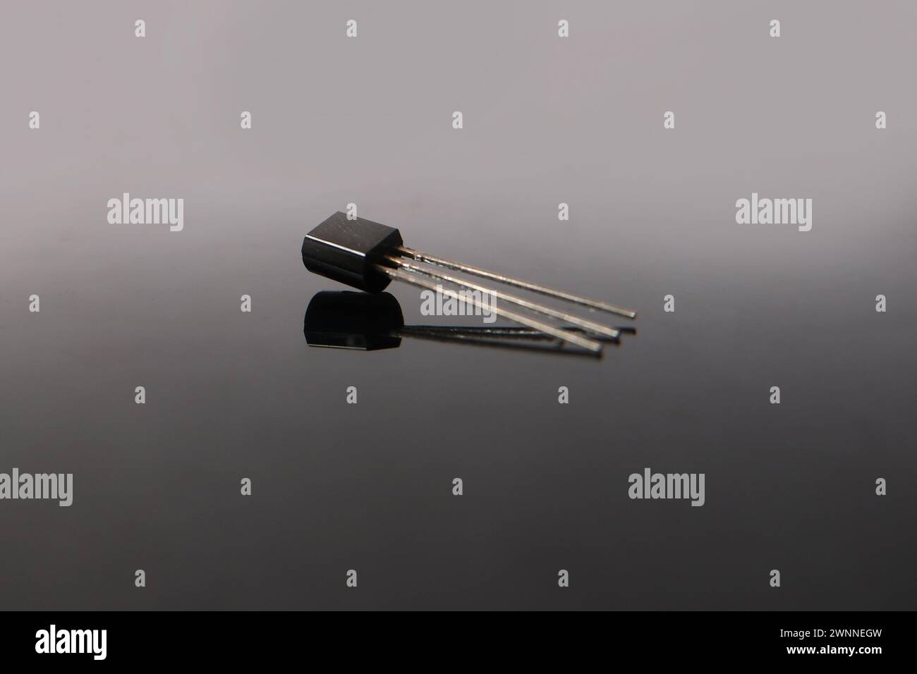 Transistor. Semiconductor electronic component isolated on the black ...