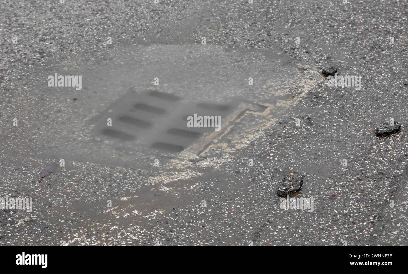 clogged cast iron drain which does not allow the water to flow out and ...