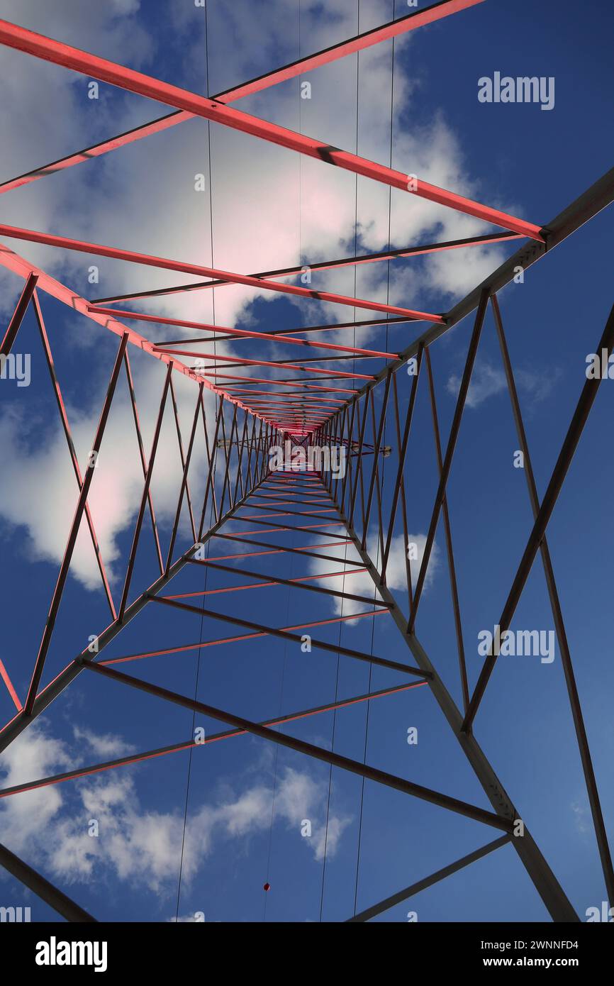 High Voltage Electricity Grid Pylon seen from below Stock Photo - Alamy