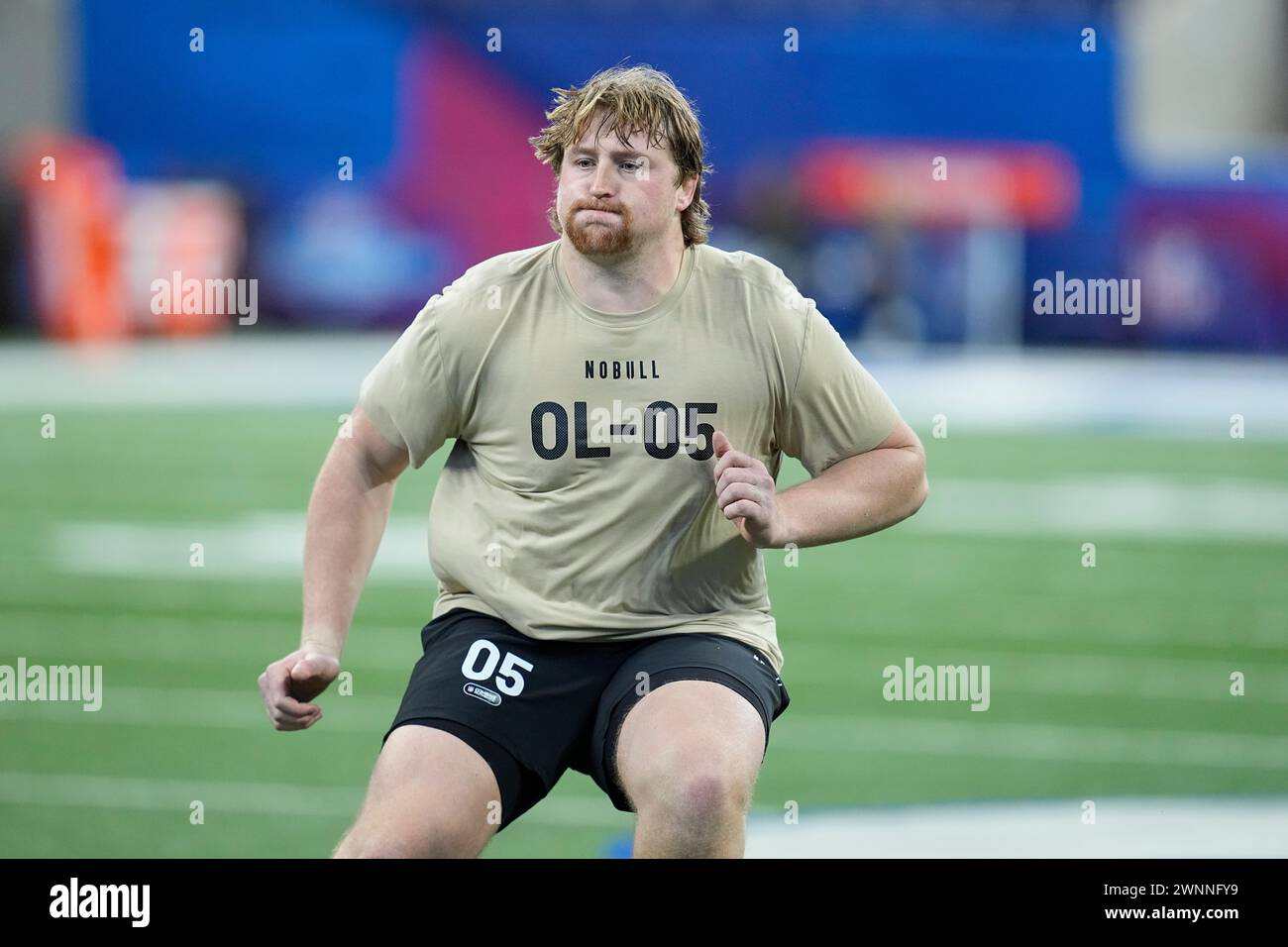 Michigan offensive lineman Karsen Barnhart runs a drill at the NFL ...
