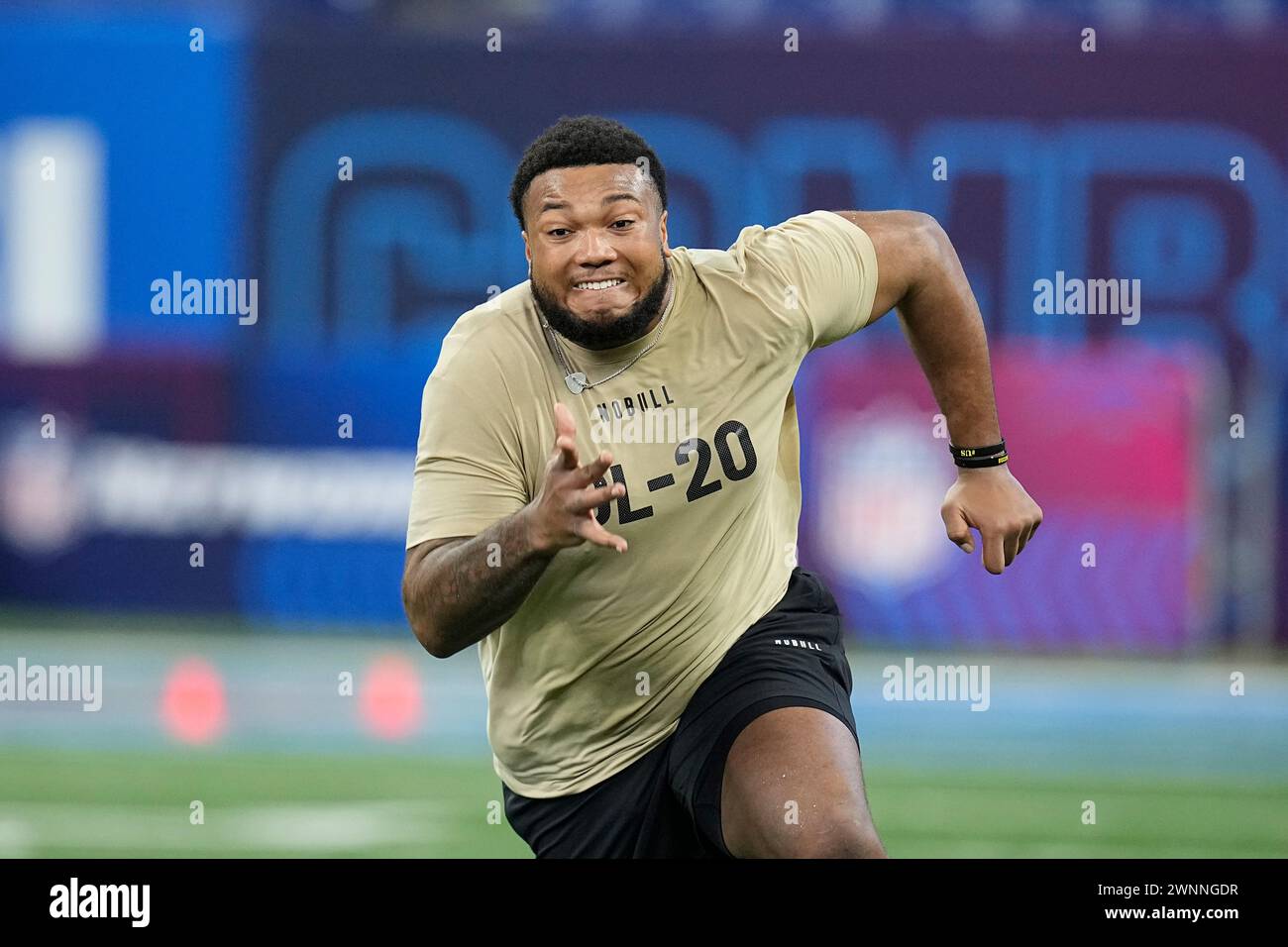 Notre Dame offensive lineman Blake Fisher runs a drill at the NFL ...