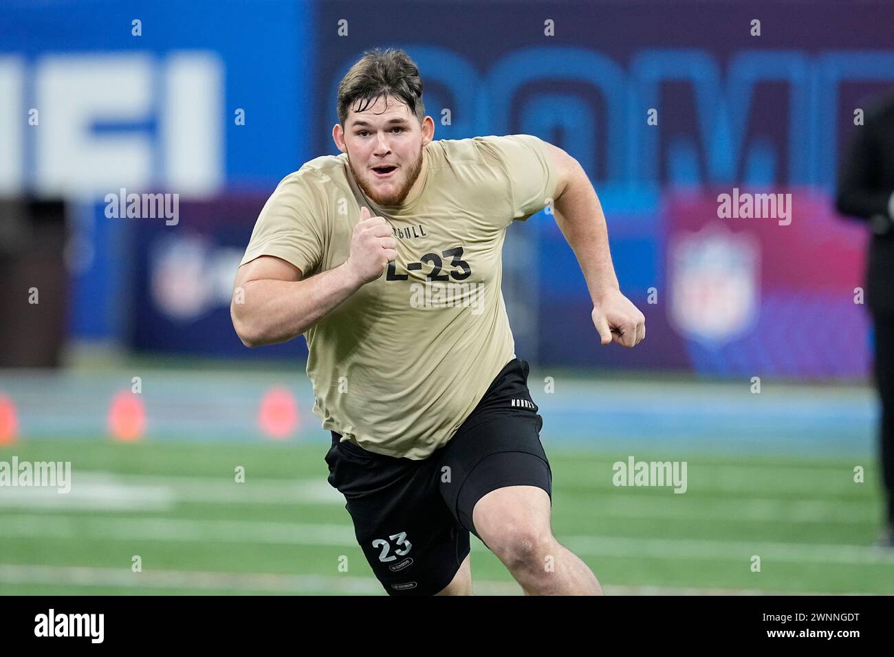 West Virginia offensive lineman Zach Frazier runs a drill at the NFL football scouting combine ...