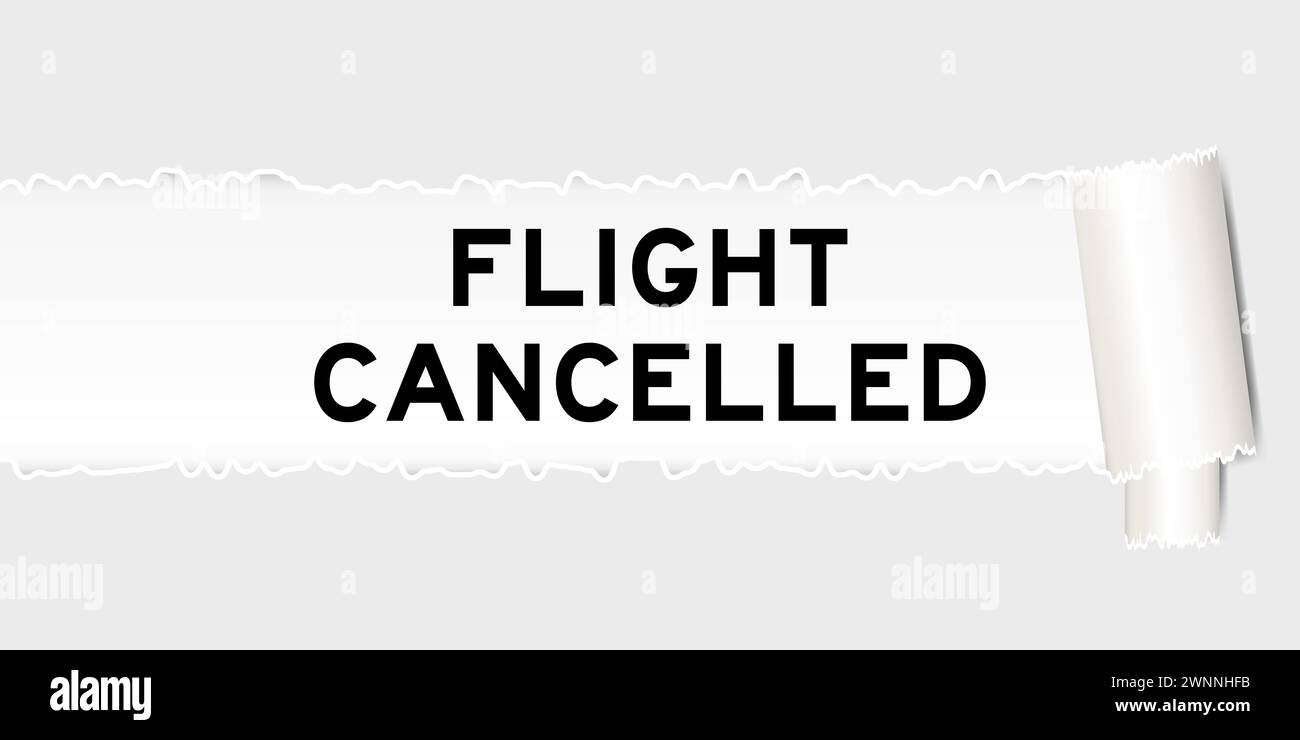 Ripped gray paper background that have word flight cancelled under torn ...