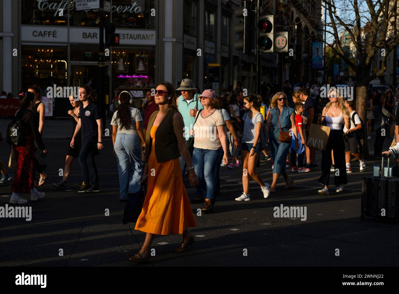 Pedestrians crossing the road at the junction of Long Arce and Great ...
