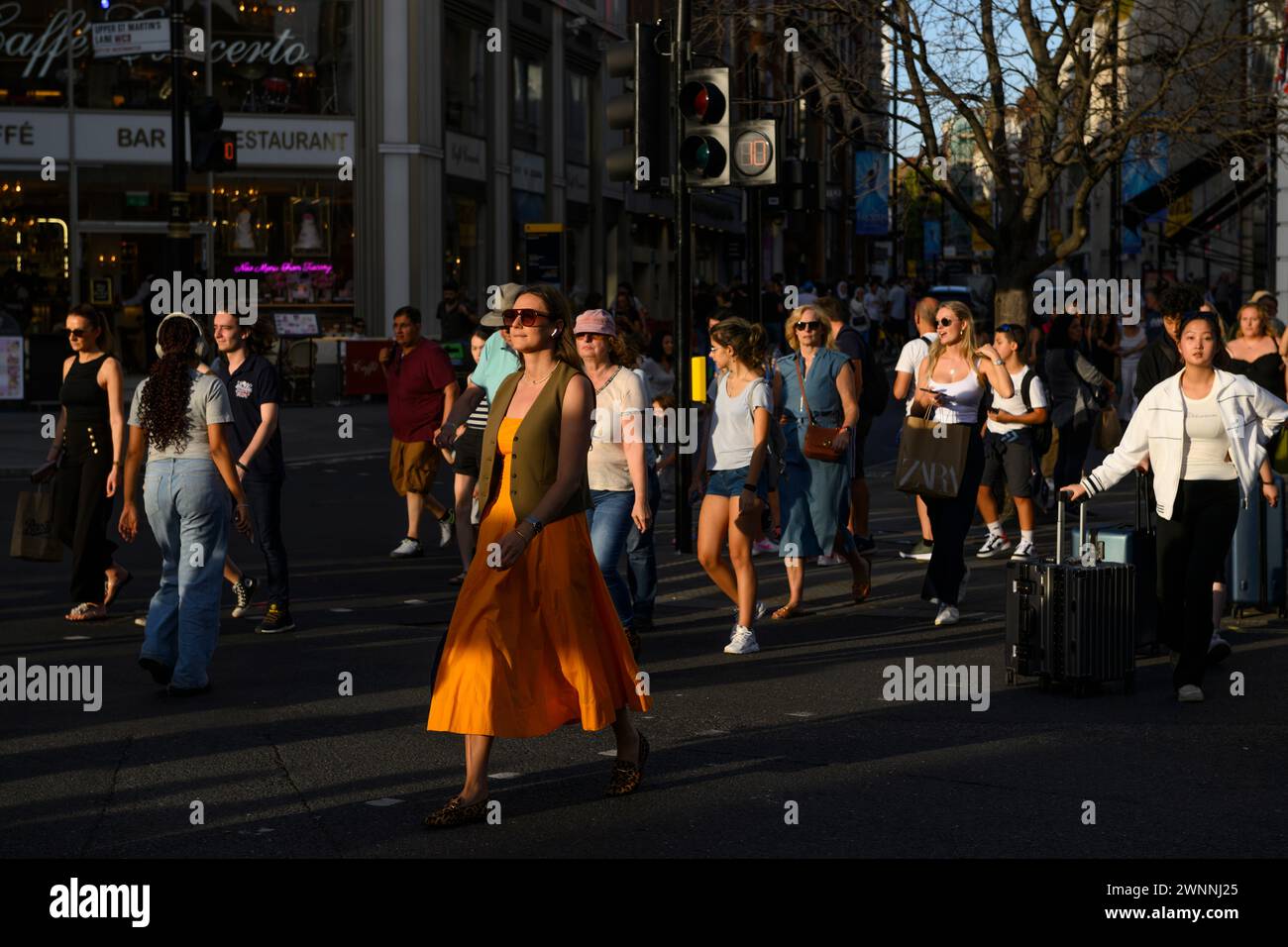 Pedestrians crossing the road at the junction of Long Arce and Great ...