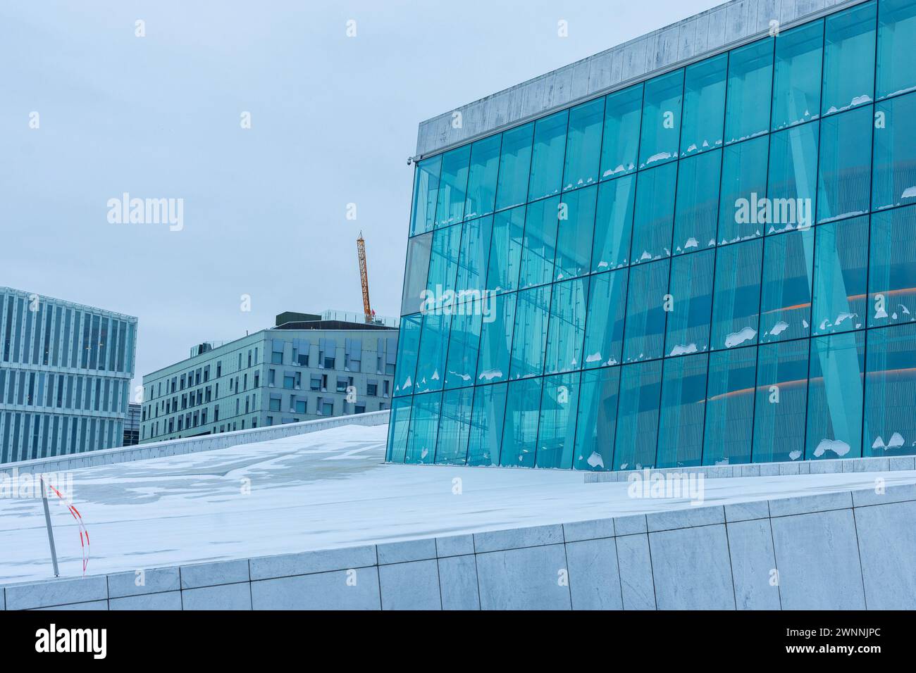 Detail of Opera house in Oslo during the midday in winter. Cloudy ...