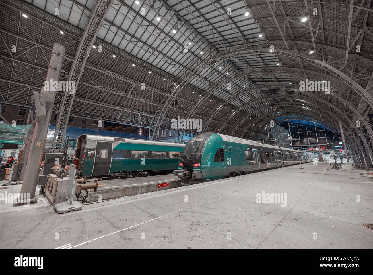 Train station of Bergen in early morning hours. Train standing on a ...