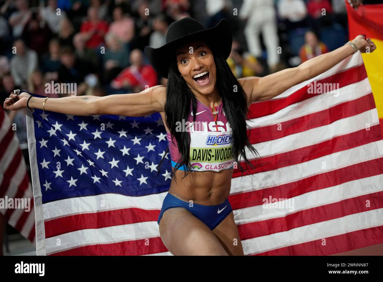 Tara Davis-Woodhall, of the United States, poses after winning the gold ...