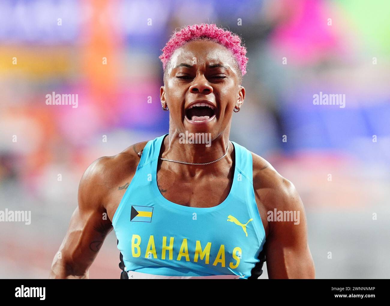 Bahamas' Devynne Charlton sets a world record taking gold in the Women's 60m Hurdle final during ...