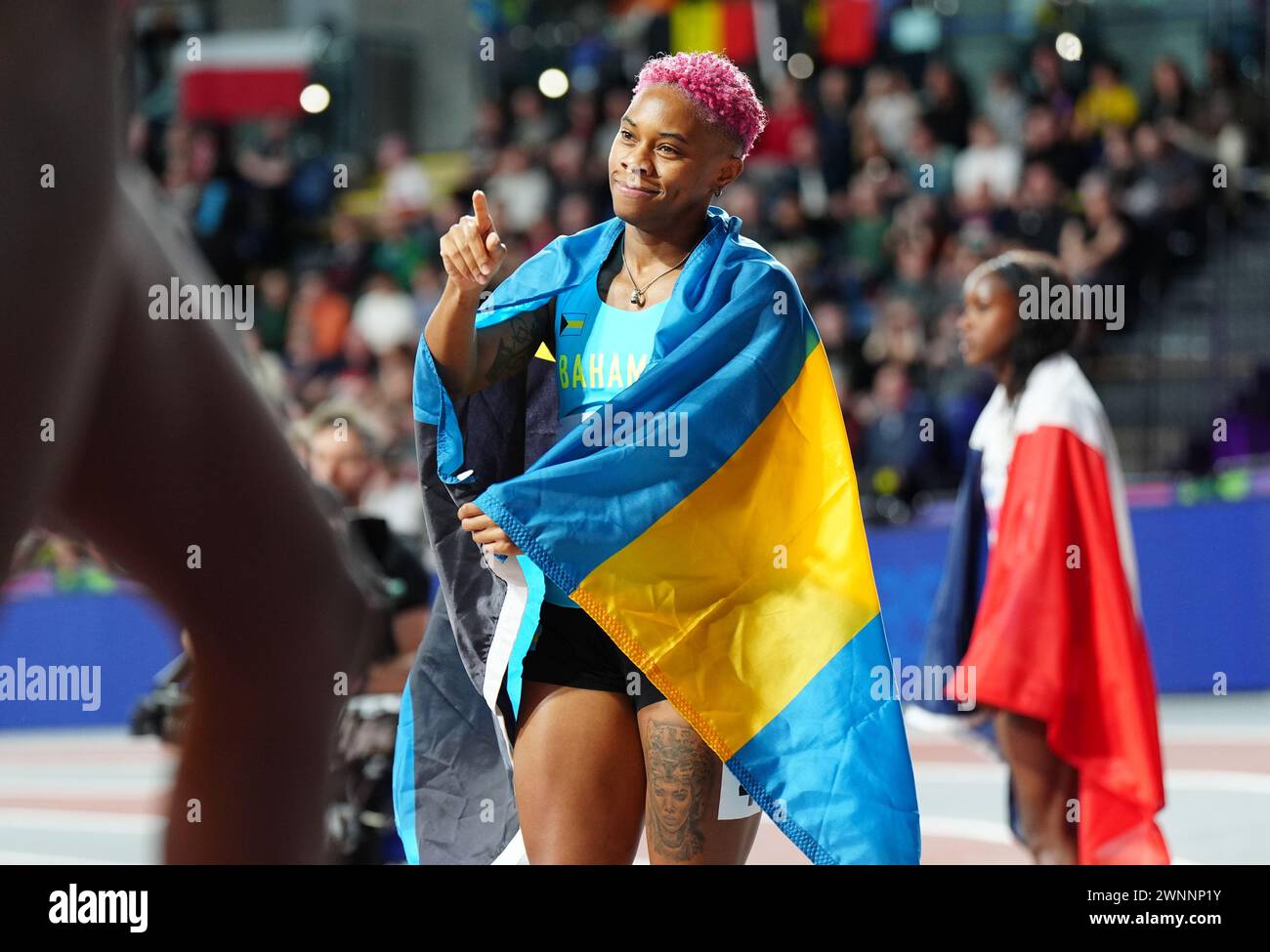 Bahamas' Devynne Charlton sets a world record taking gold in the Women's 60m Hurdle final during ...