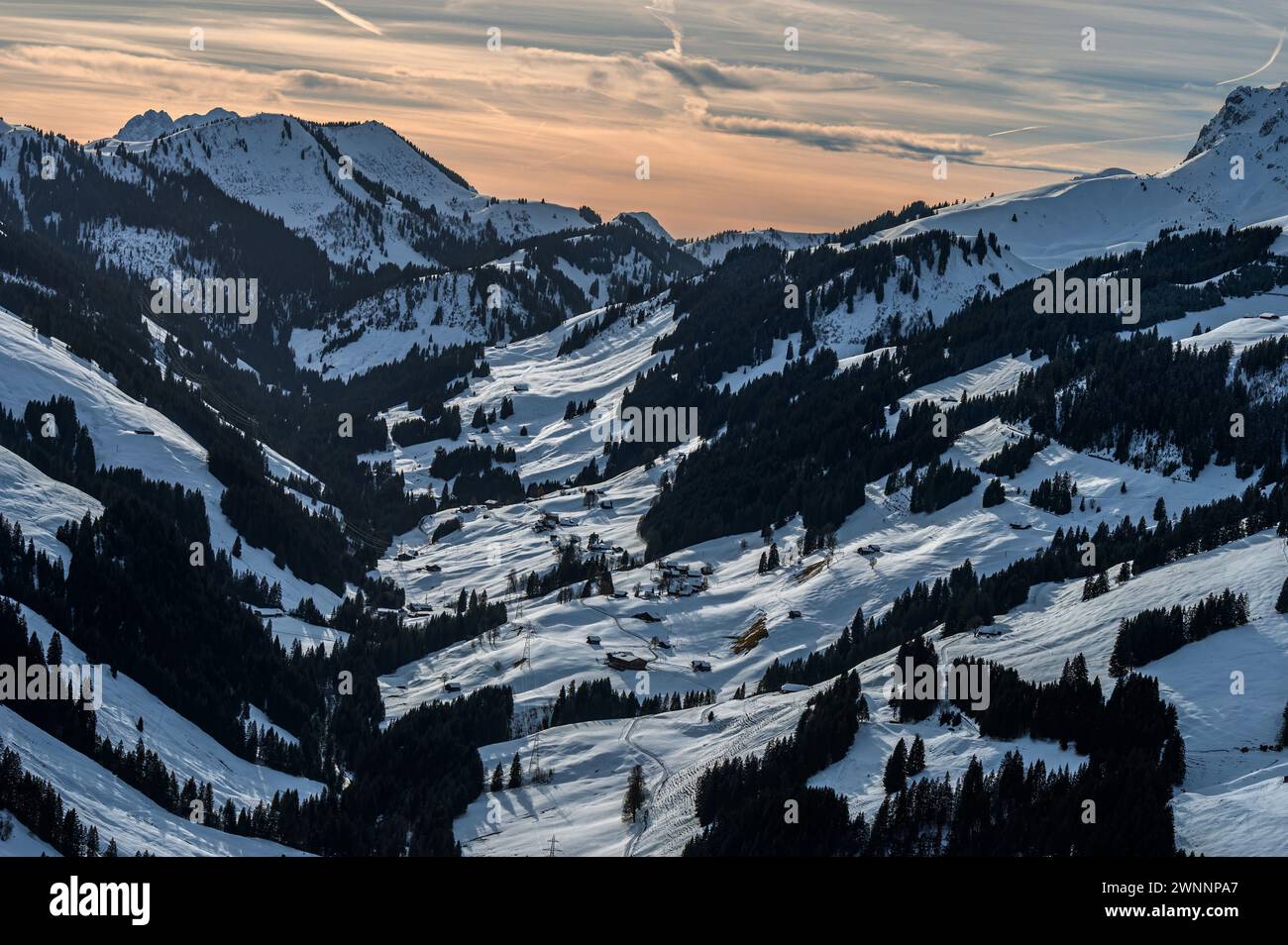Winter landscape of Swiss village in Switzerland. Mountain, sky and ...