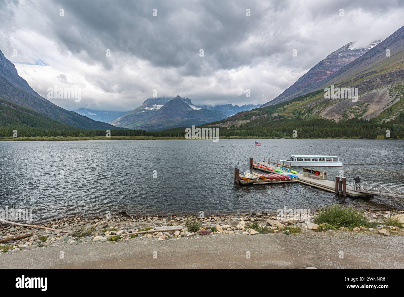 Chief Two Guns tour boat approaching the floating dock on Swiftcurrent ...