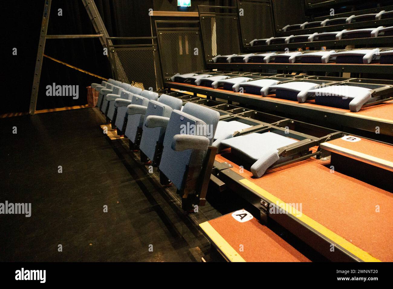 Shut Down Theatre Cinema With Folded Collapsed Seats Stock Photo - Alamy