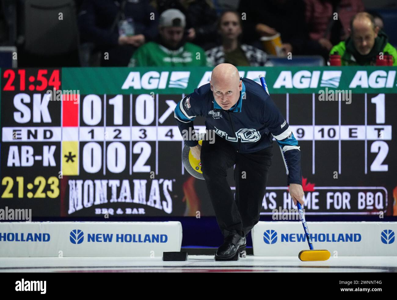 Regina, Canada. 03rd Mar, 2024. Alberta-Koe skip Kevin Koe delivers a ...