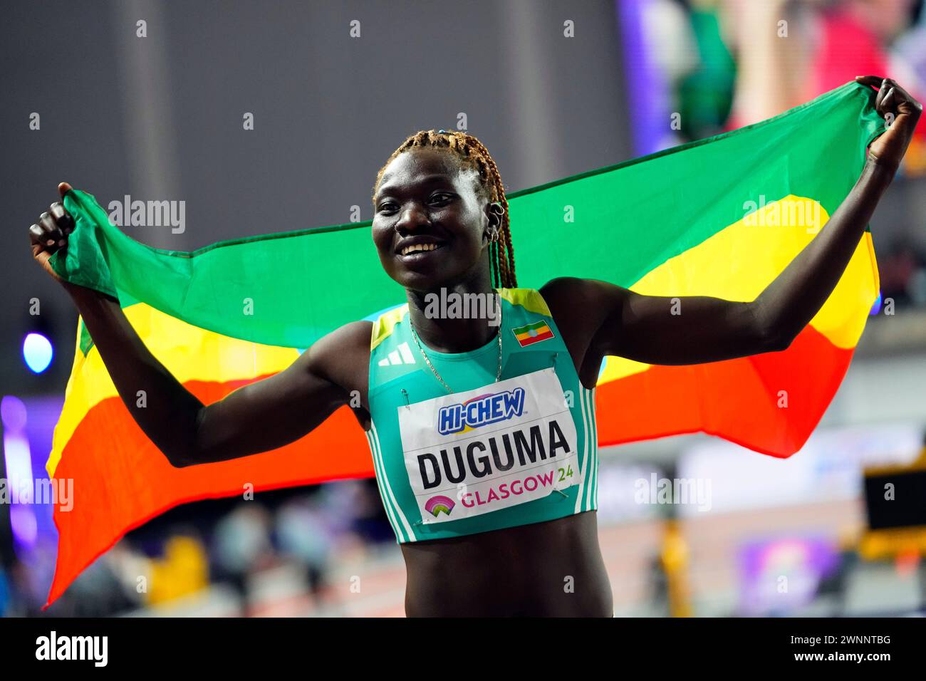 Tsige Duguma, of Ethiopia, celebrates after winning the gold medal in ...
