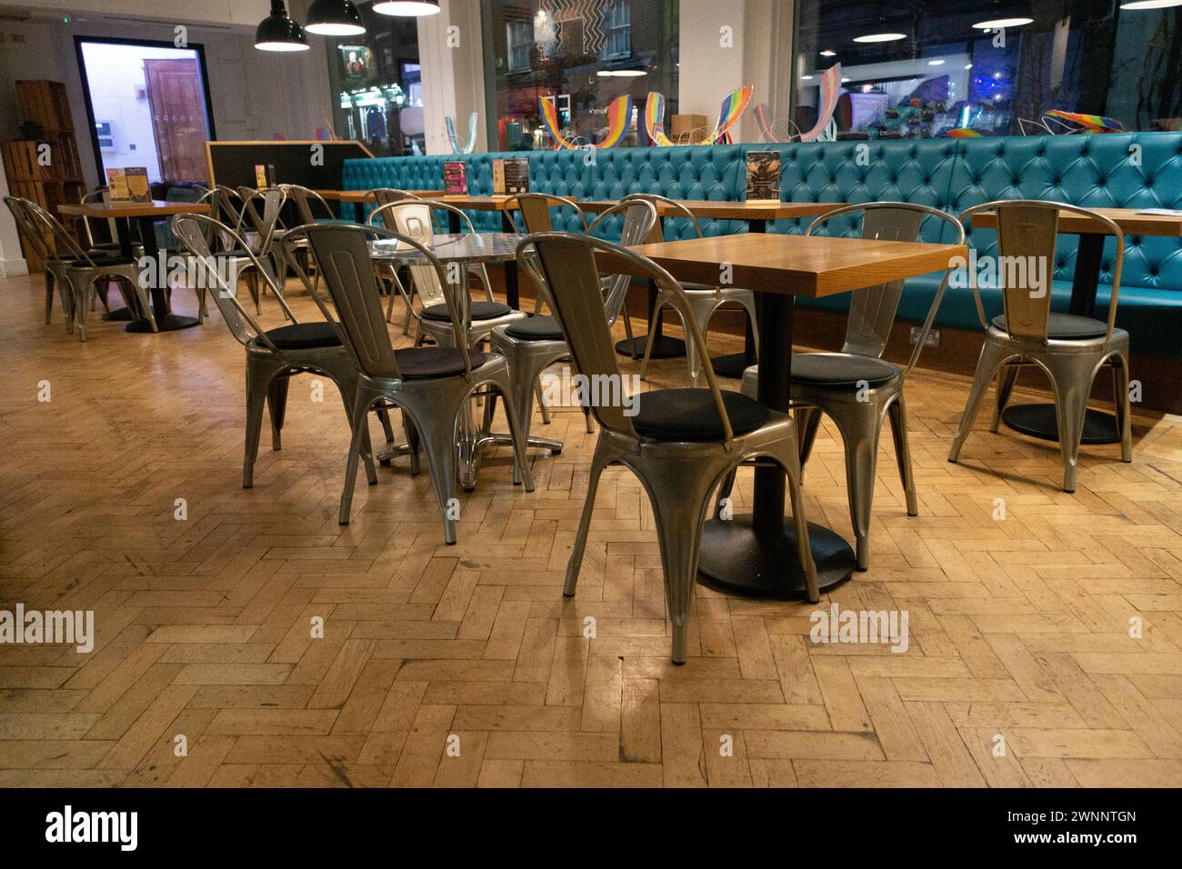 Empty Closed Cafe with Dining Seats and Table Stock Photo - Alamy
