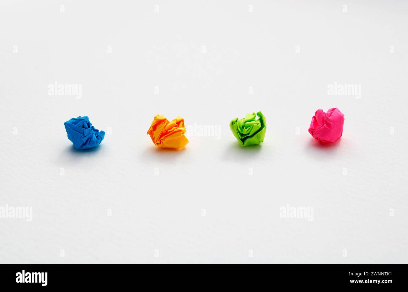 Notes of different colors in a row crumpled and discarded Stock Photo ...