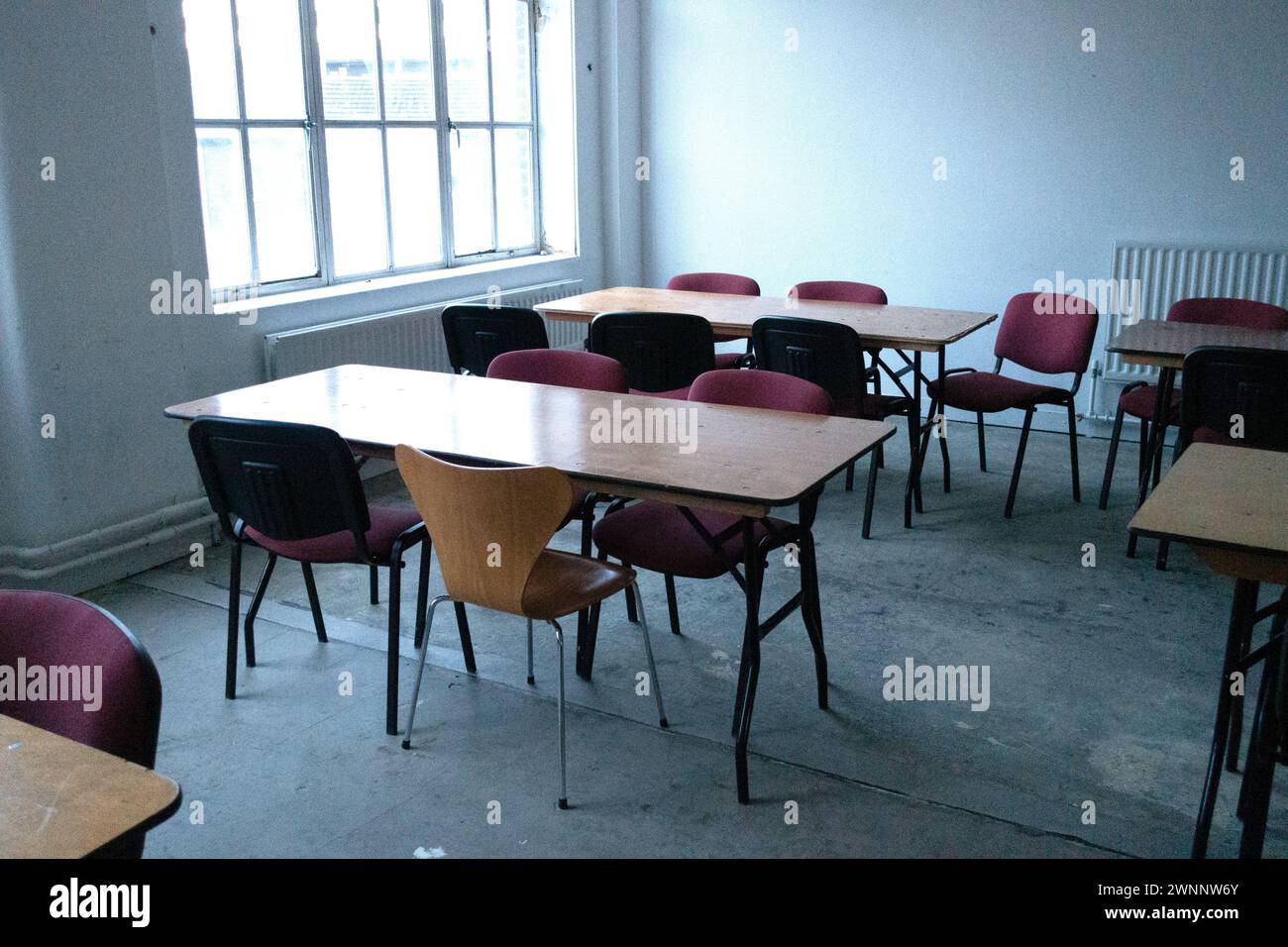 Empty Desolote Classroom With Empty Desk and Seats Stock Photo - Alamy
